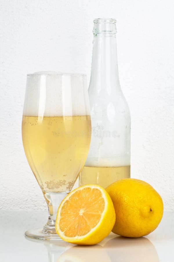 Beer with Lemon Flavor stock image. Image of alcohol - 32599079