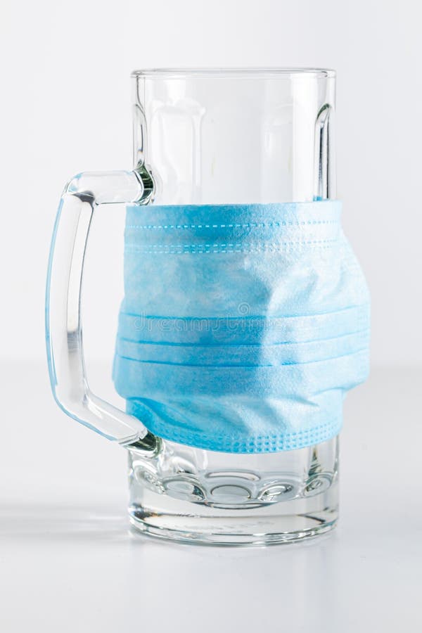 Beer Mug in a Protective Mask. Coronavirus Limitation in Pub Stock ...