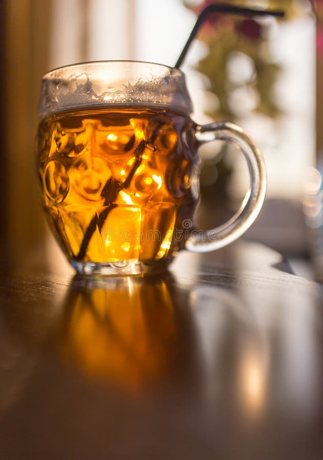 A beer mug in a restaurant stock image. Image of yellow - 89530047