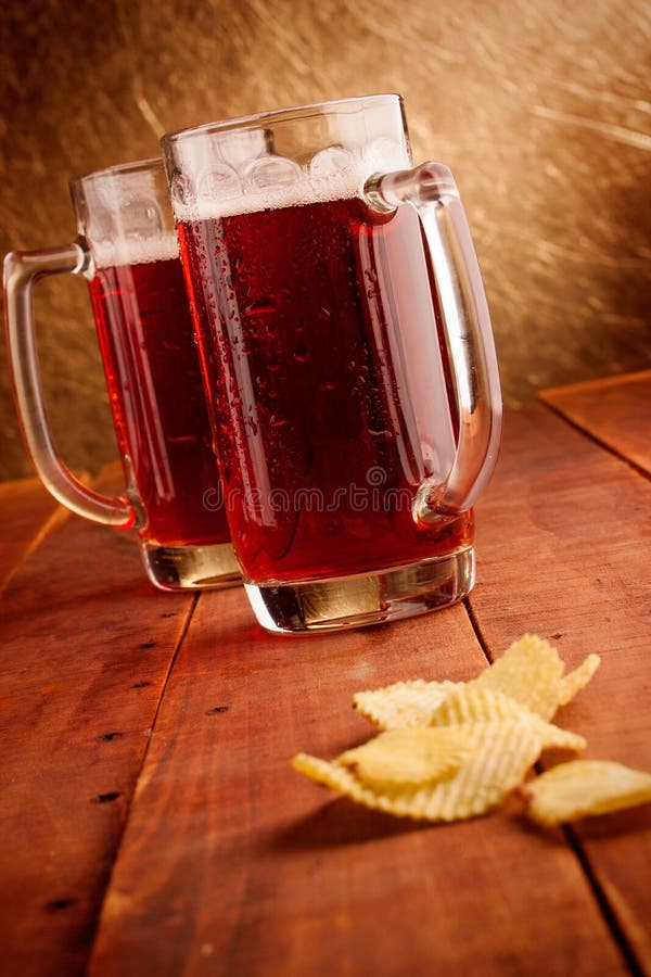 Beer Mugs and Potatoe Chips Stock Image - Image of potato, restaurant ...