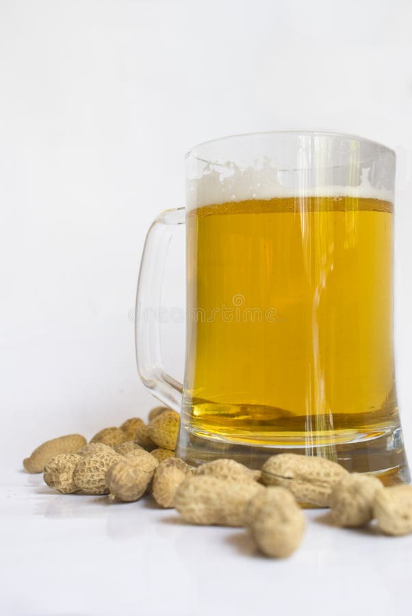 Beer & peanuts stock photo. Image of alcohol, liquid - 9048558