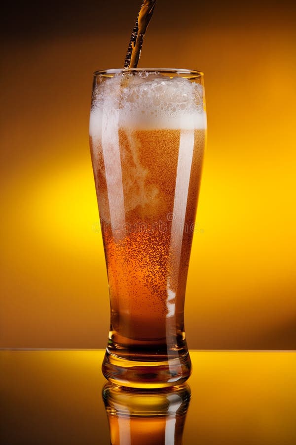 Beer pouring stock image. Image of pouring, bubbles, backlight - 9009997