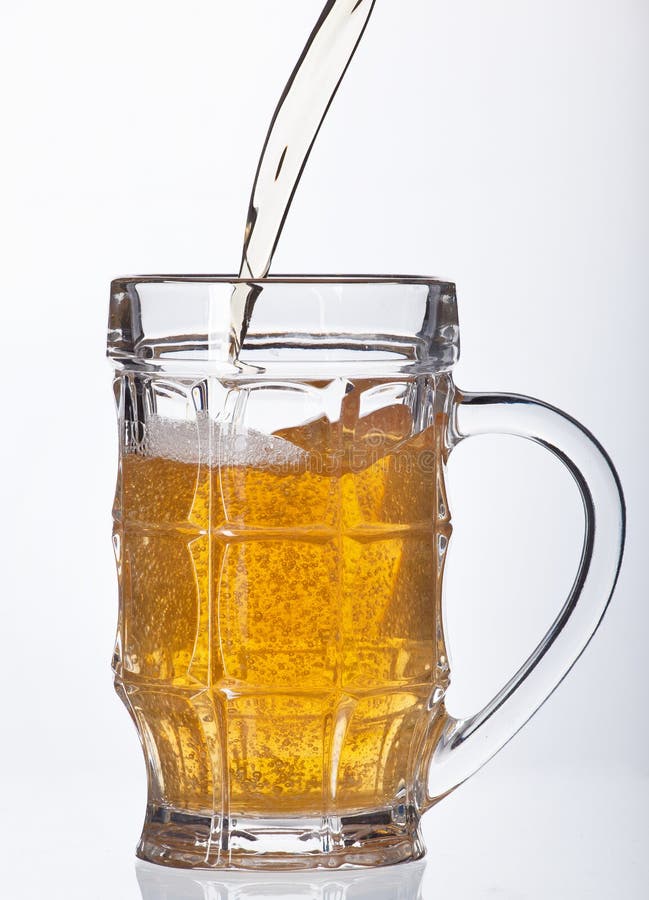 Beer pouring into beer mug stock photo. Image of fresh - 27469070