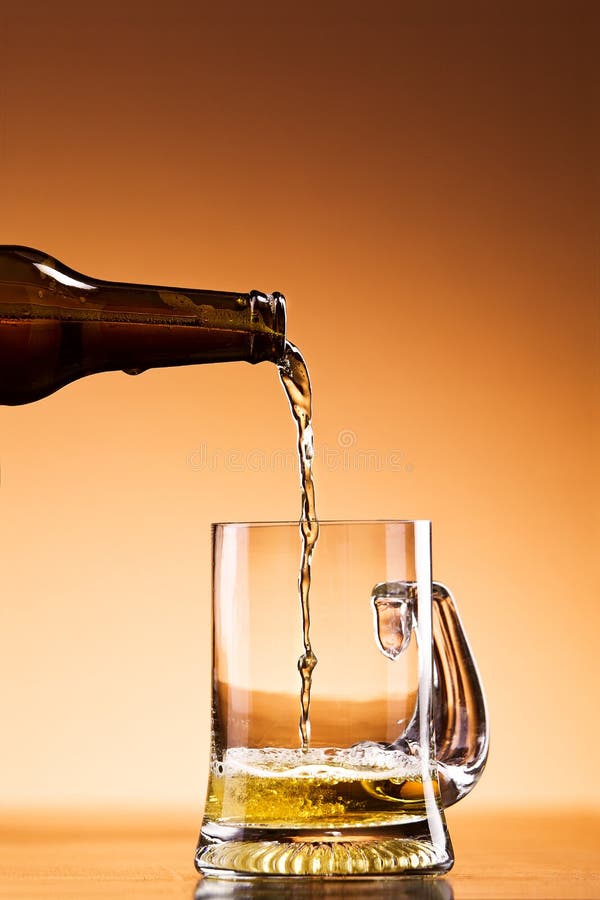 Beer pouring stock photo. Image of gold, bottle, brewery - 32043706