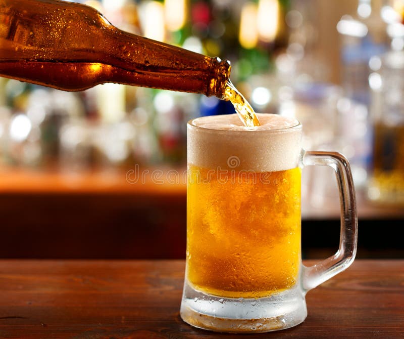 Delicious Beer Mug on a Bar Stock Photo - Image of fashioned ...