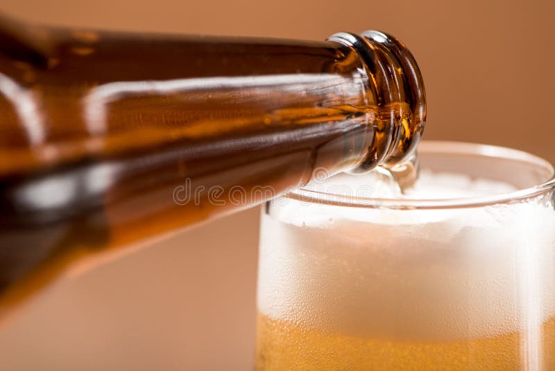 Beer Pouring from Top in Bottle on Wood Table Stock Image - Image of ...