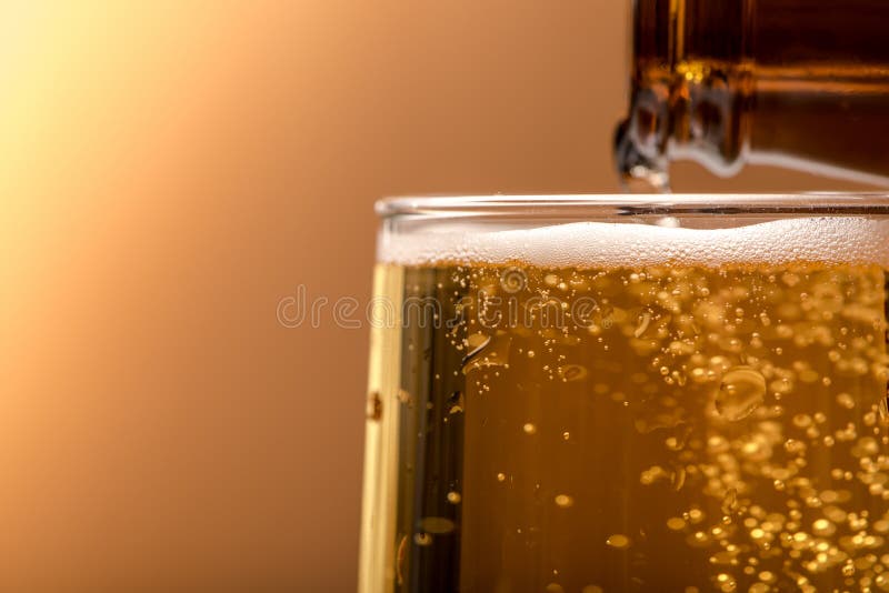 Beer Pouring from Top in Bottle on Wood Table Stock Image - Image of ...