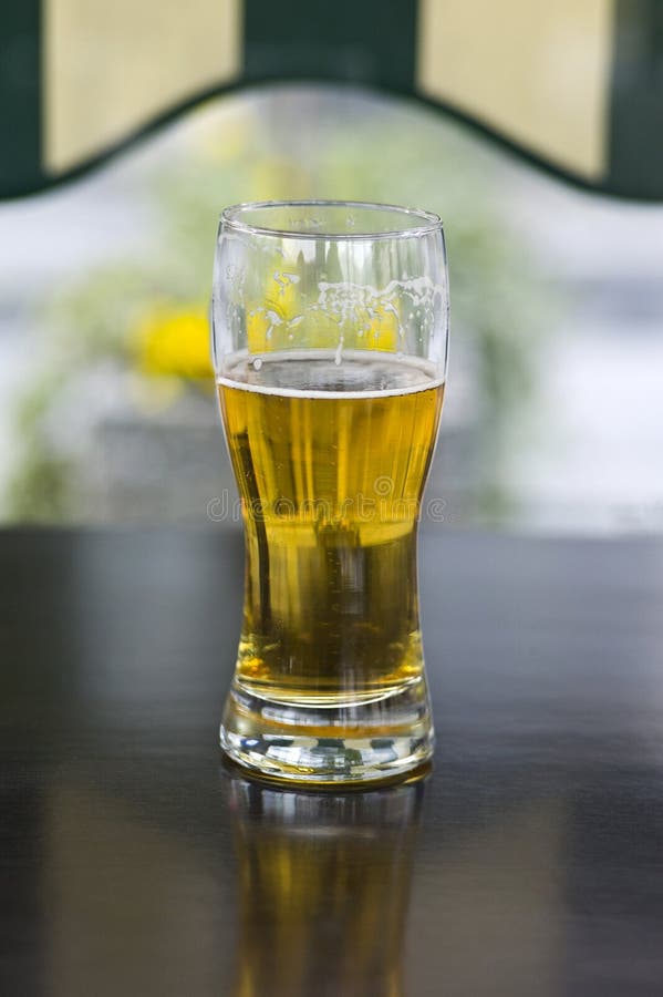 Beer on pub table stock photo. Image of shiny, yellow - 43272174