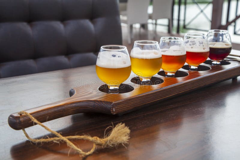 Beer Set, Set of Glasses of Light and Dark Beer on a Pub Background ...