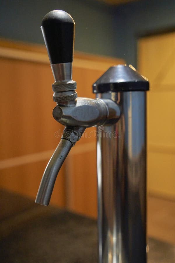 Beer Shooter, this Beer Tap is a Work of Art Stock Photo - Image of ...