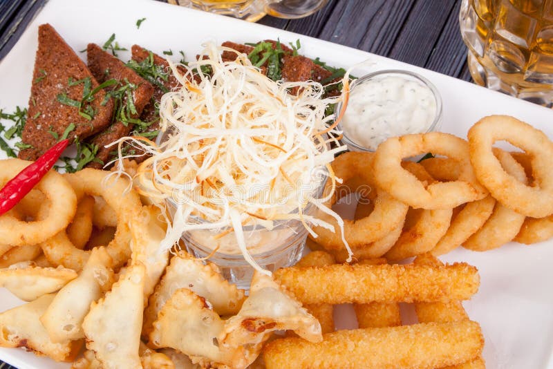 Beer Snack from Cheese Sticks, Chechel, Onions and Loaves of Beer on ...