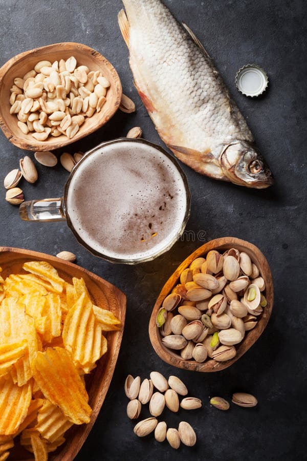 Beer and snacks stock photo. Image of drink, board, pistachio - 89332106