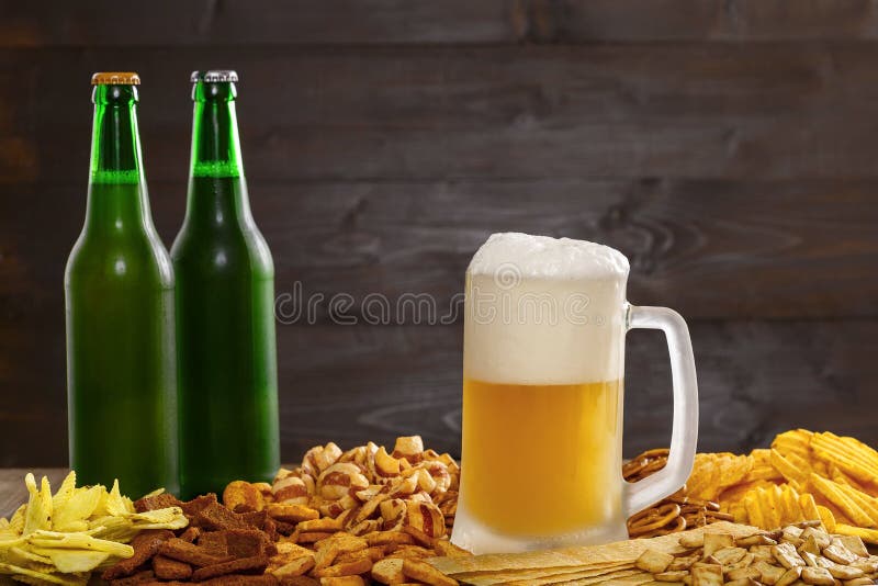 Beer and Snacks on a Wooden Table Stock Photo - Image of beer, bottles ...