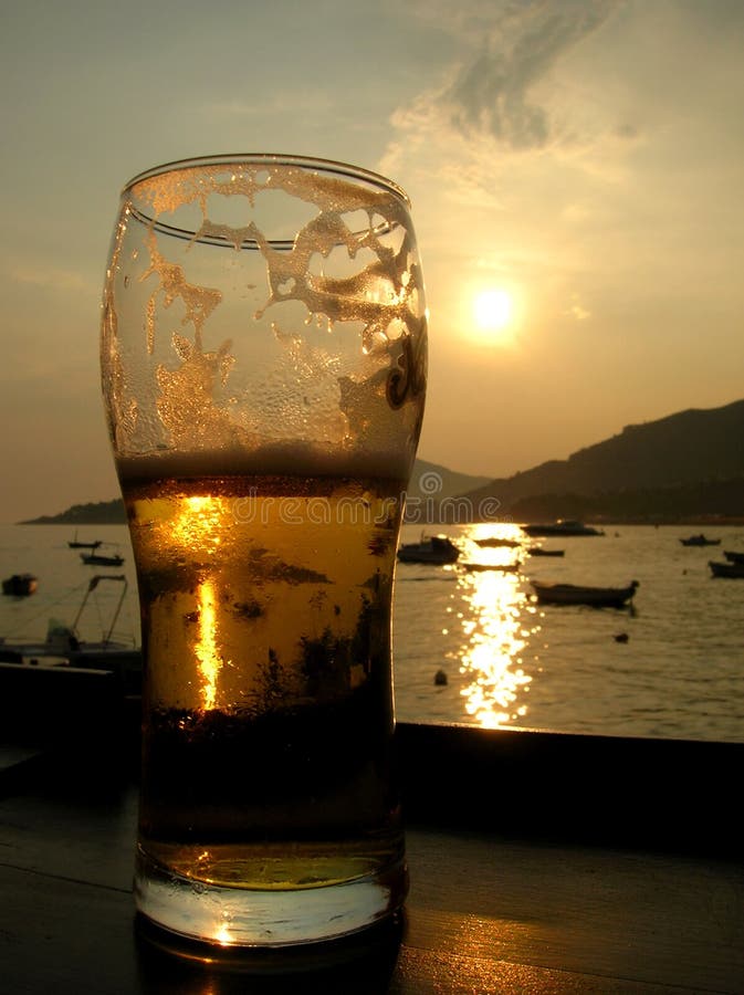Beer in the sunset stock image. Image of sunlight, yellow - 12041869