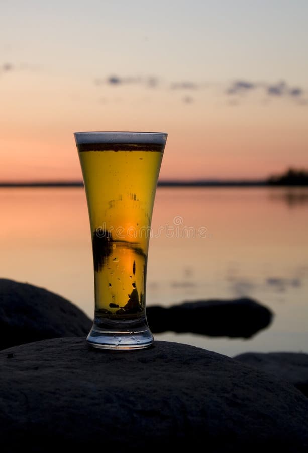 Beer in the sunset stock image. Image of sunlight, yellow - 12041869