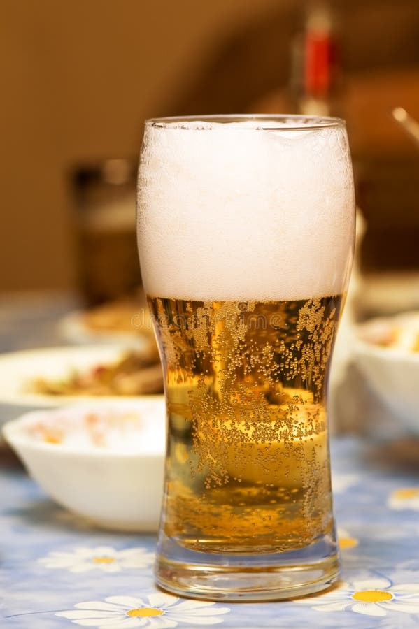 Beer on the table stock image. Image of drink, glass, pint - 5551831