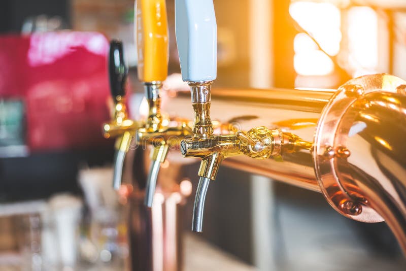 The Beer tap stock photo. Image of closeup, counter - 129757742