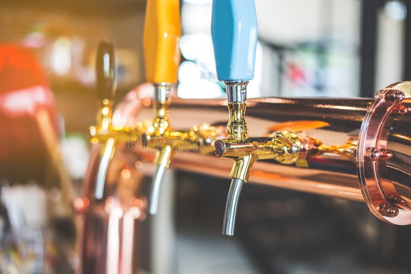 The Beer tap stock photo. Image of bartender, draft - 129757760