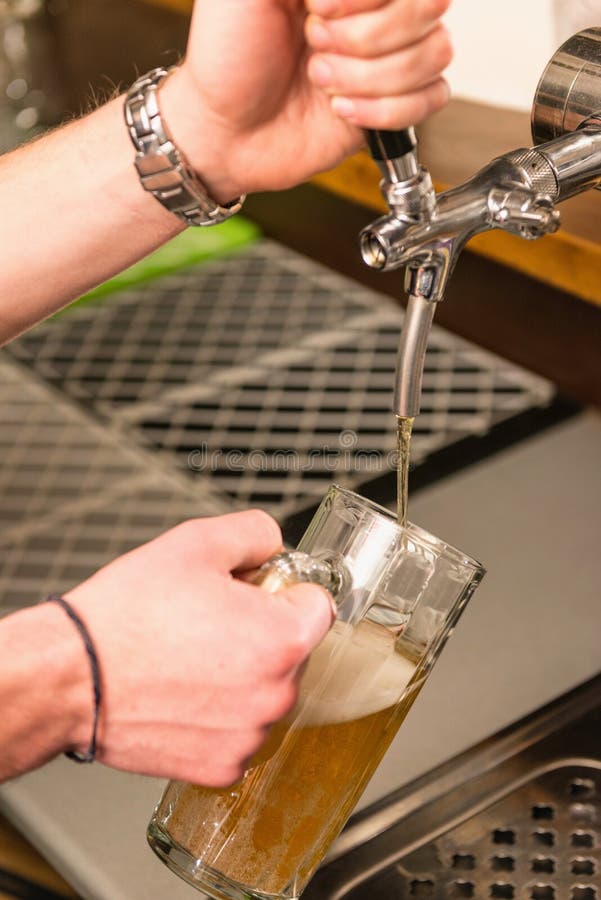 Beer Tap stock photo. Image of people, life, bartender - 220231996