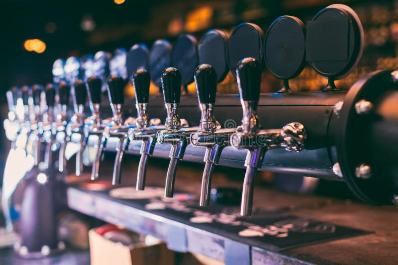 Beer Tap Row. Beer Tap in the Bar. Stock Image - Image of club, brown ...