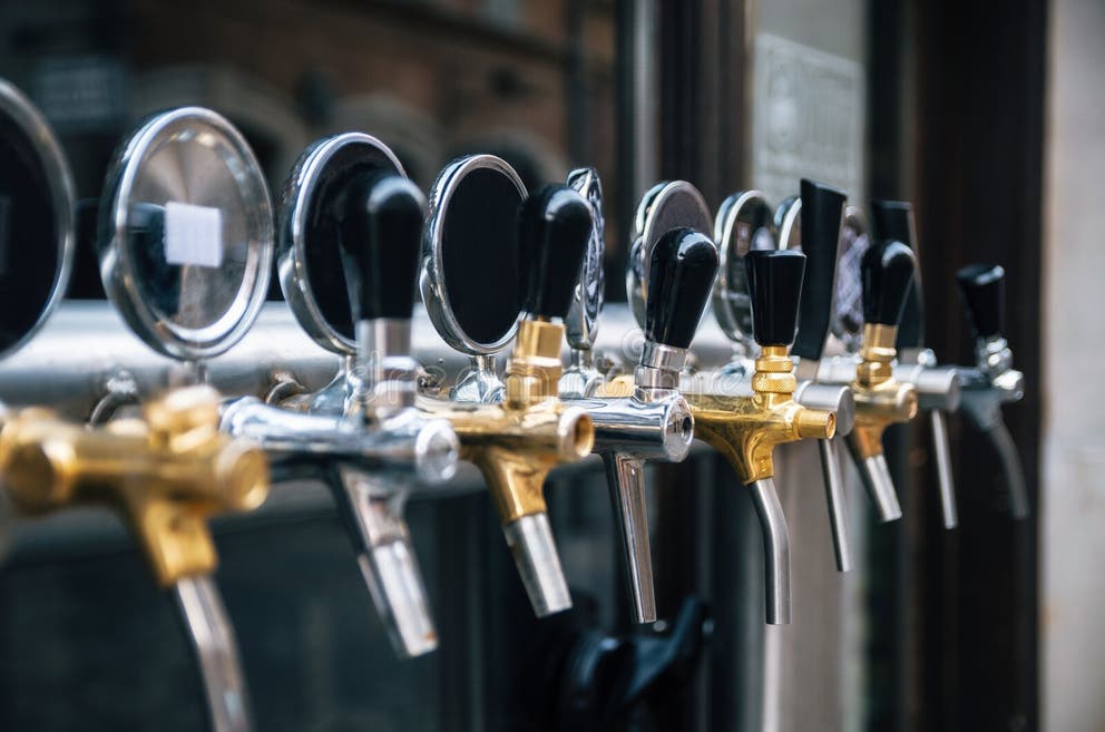 Beer tap in a row stock image. Image of equipment, brown - 118229703