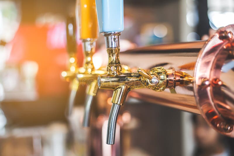 The Beer tap stock photo. Image of counter, brown, cold - 129757666