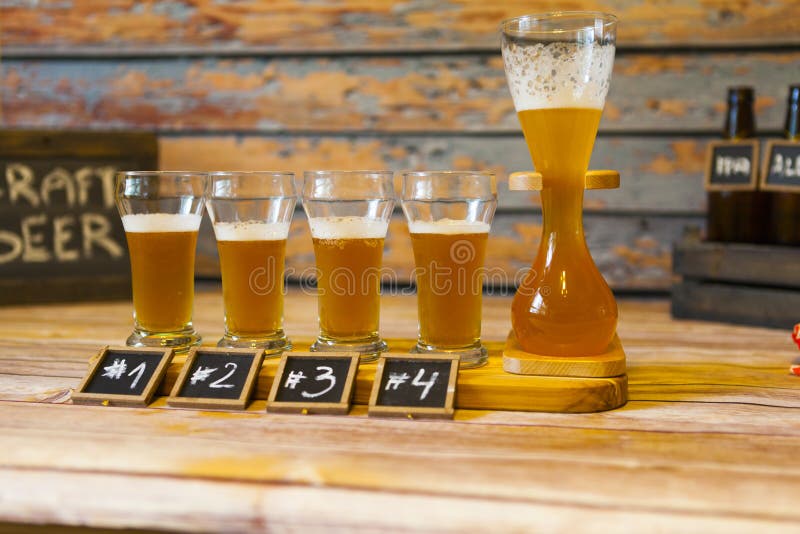 Beer Samplers at Brewery stock photo. Image of microbrew - 32648784