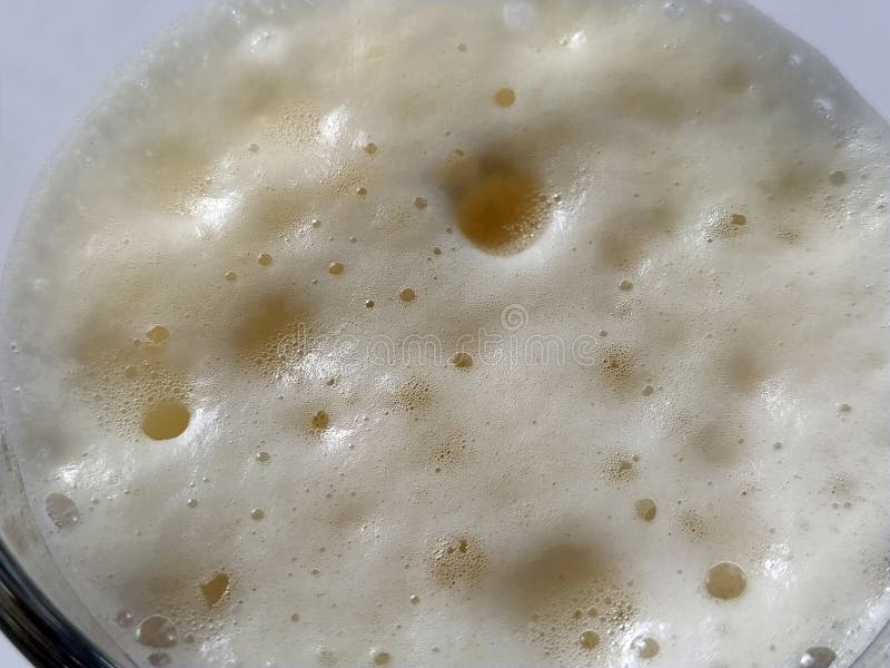 Beer from the Top. Close-up of Thick Beer Foam in a Glass Stock Image ...