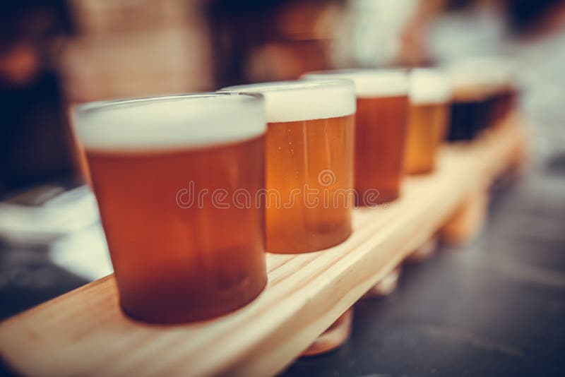 Beers for tasting stock image. Image of tasting, table - 130973749