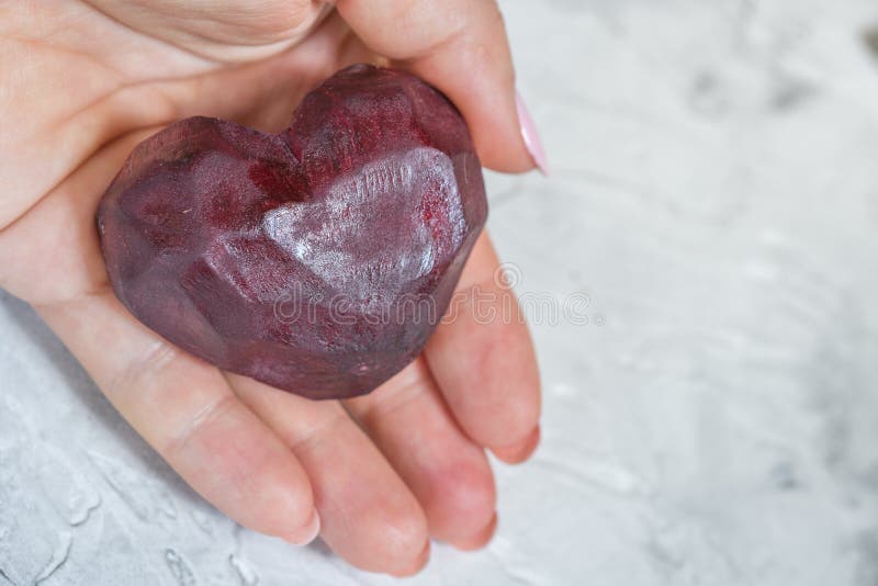 Beet heart in a hand stock photo. Image of organic, nature - 153583460