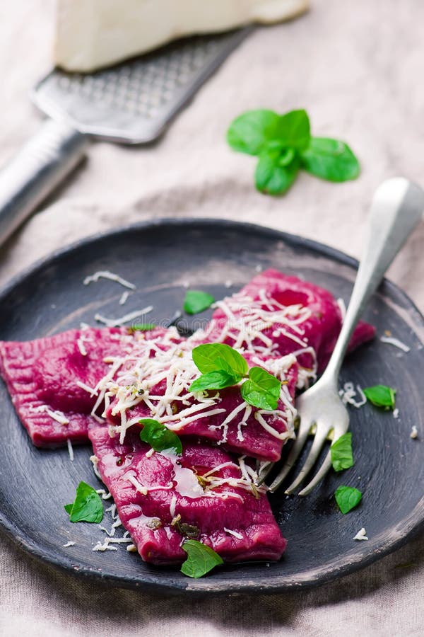 Beet Ravioli with Goat Cheese Stock Image - Image of fork, plate: 76380535