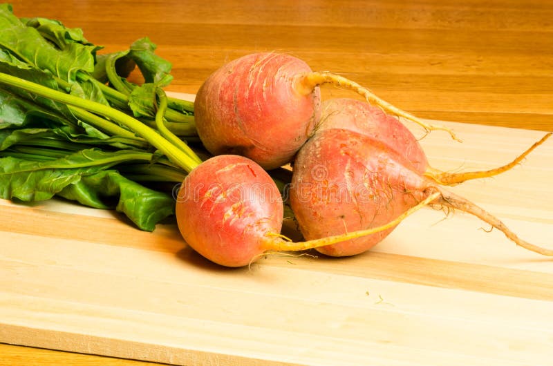 Beet Roots on Wooden Cutting Board Stock Image - Image of green ...