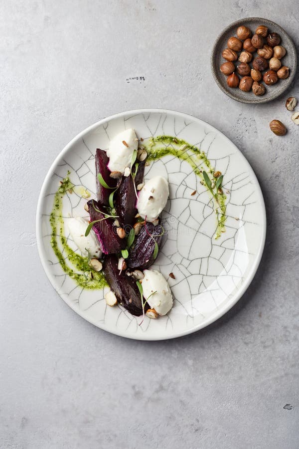 Beetroot and Cream Cheese Salad with Nuts and Pesto Sauce Stock Photo ...