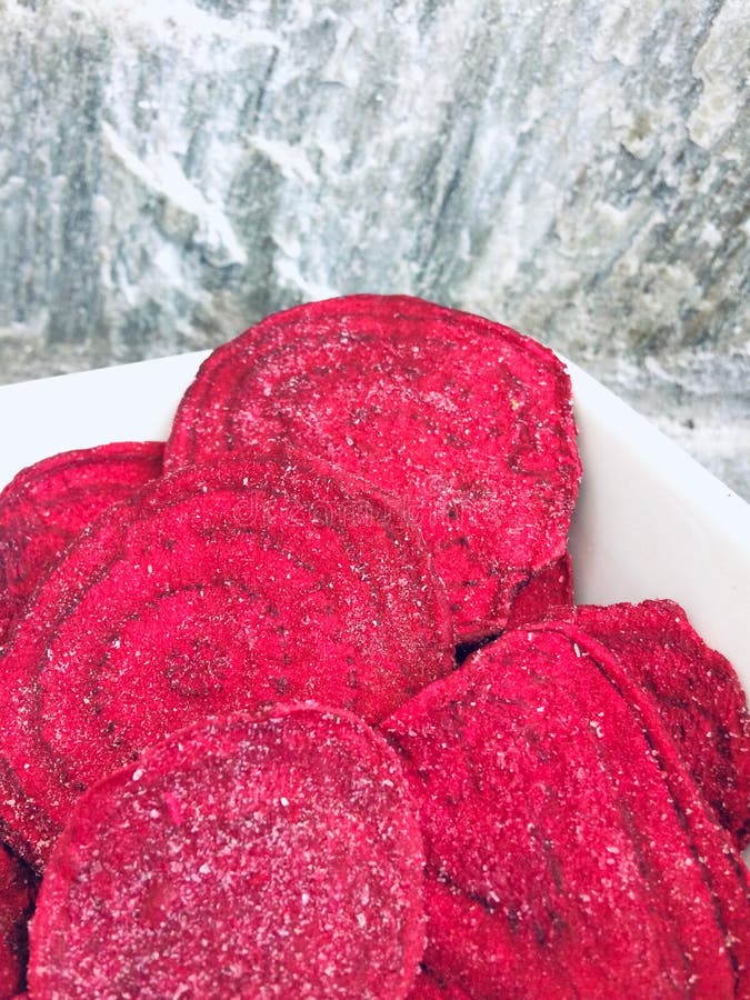 Beetroot. Crispy Beetroot Slices on White Plate with Gray Background ...