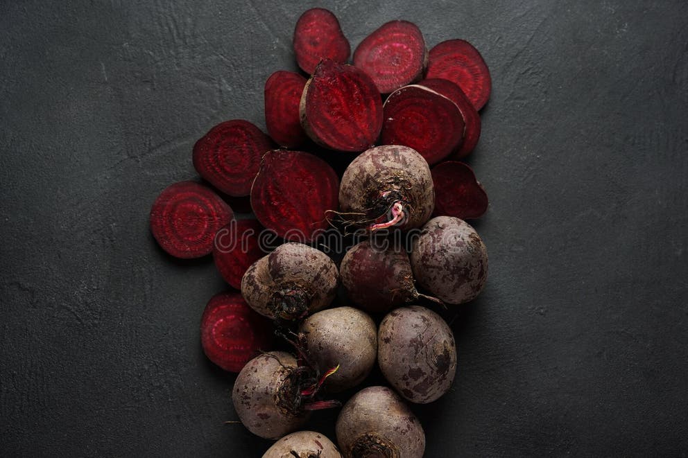 Beetroot Cut on Dark Table.Sliced Beetroot on Black Kitchen Table Stock ...
