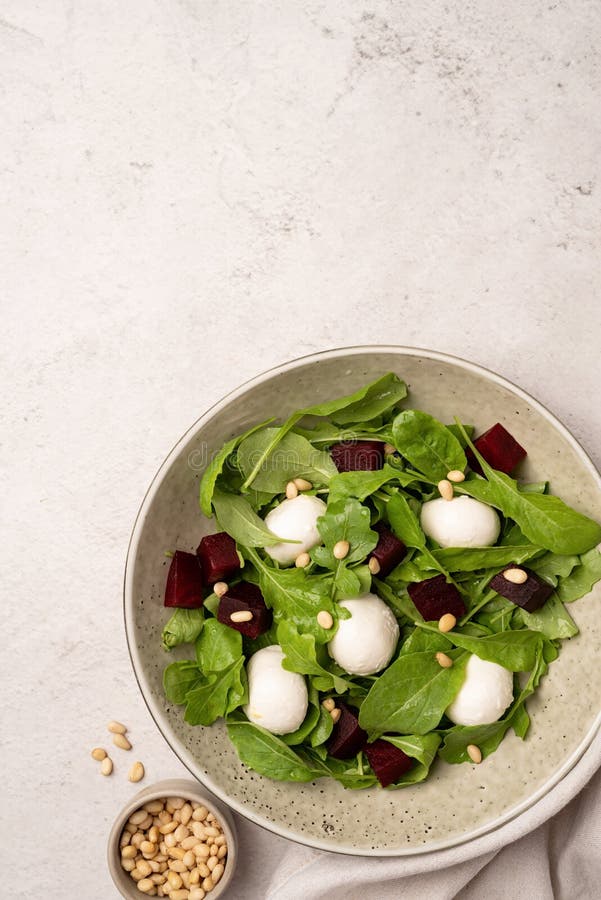 Beetroot, Mozzarella and Arugula Salad with Pine Nuts Top View Stock ...