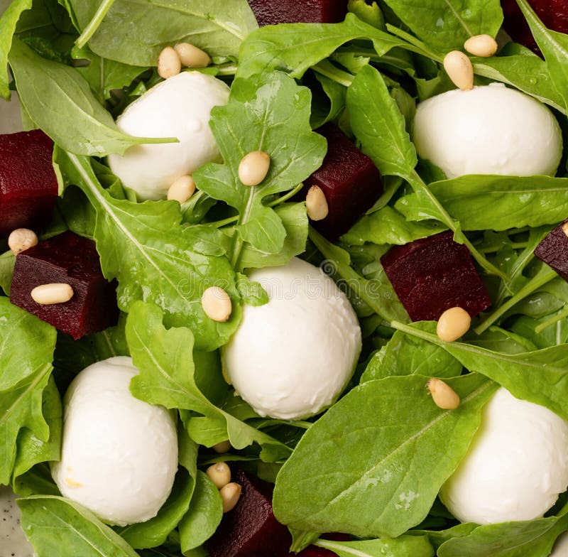 Beetroot, Mozzarella and Arugula Salad with Pine Nuts Top View Stock ...
