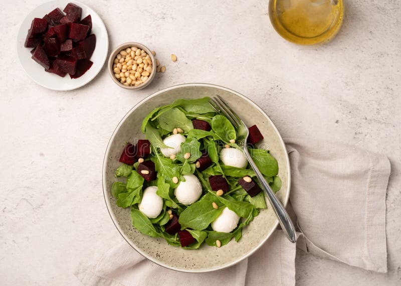 Beetroot, Mozzarella and Arugula Salad with Pine Nuts Top View Stock ...