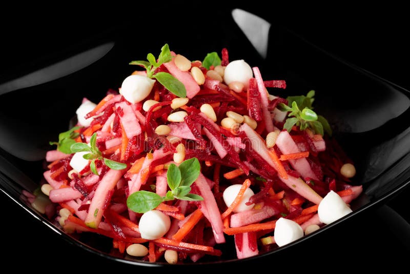 Beetroot and Pear Salad with Mozzarella Isolated on Black Stock Image ...