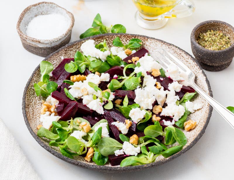 Beetroot Salad with Feta, Cheese, Walnuts, Corn Salad on White T Stock ...