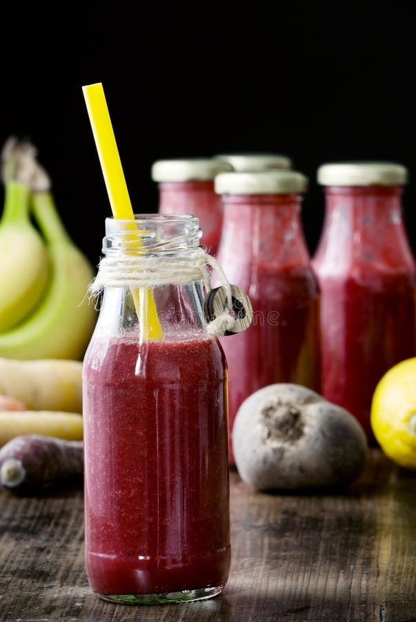 Beetroot smoothie bottle stock photo. Image of wooden - 170133378