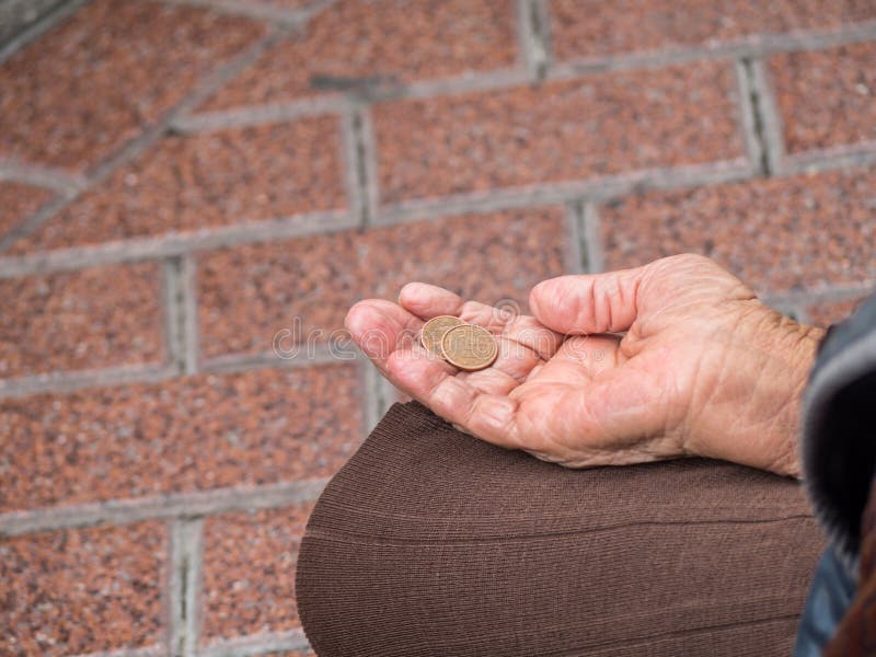Beggar holds out his hand stock image. Image of cash - 195300545