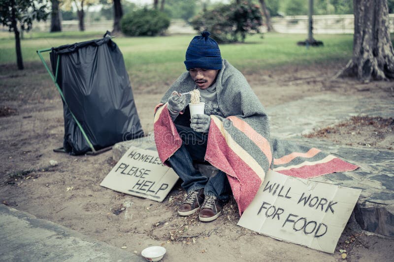 The Beggars Sat Wrapped in Cloths and Eating Noodles Stock Image ...