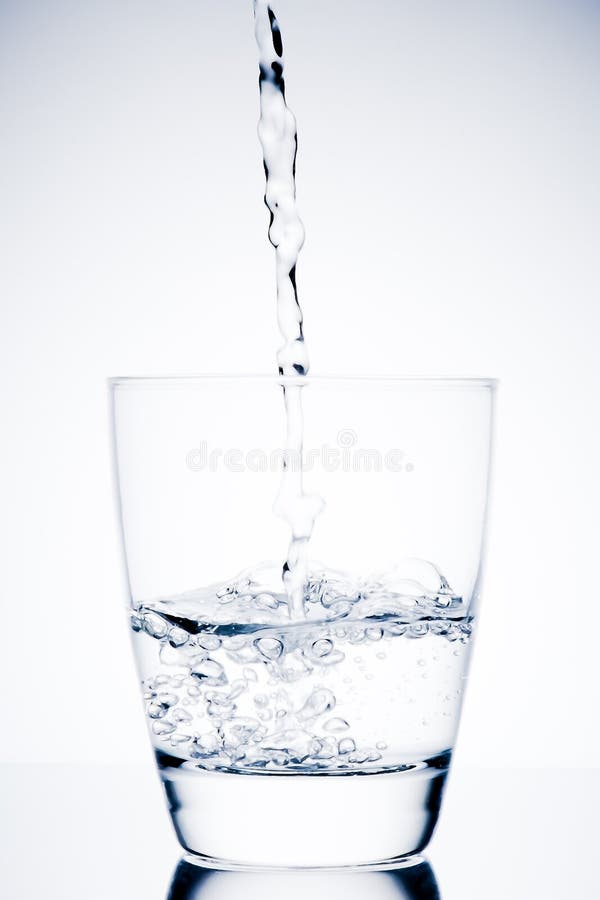 Begin Filling a Glass with Pure Water and Bubbles Stock Image - Image ...