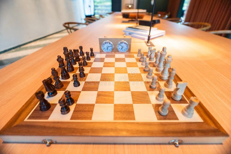 Beginning of Chess Game on a Chess Board with Black and White Chess ...