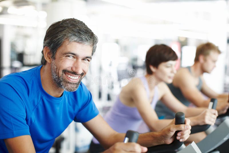The Beginning of the Circuit. a Row of People Working Out on the ...