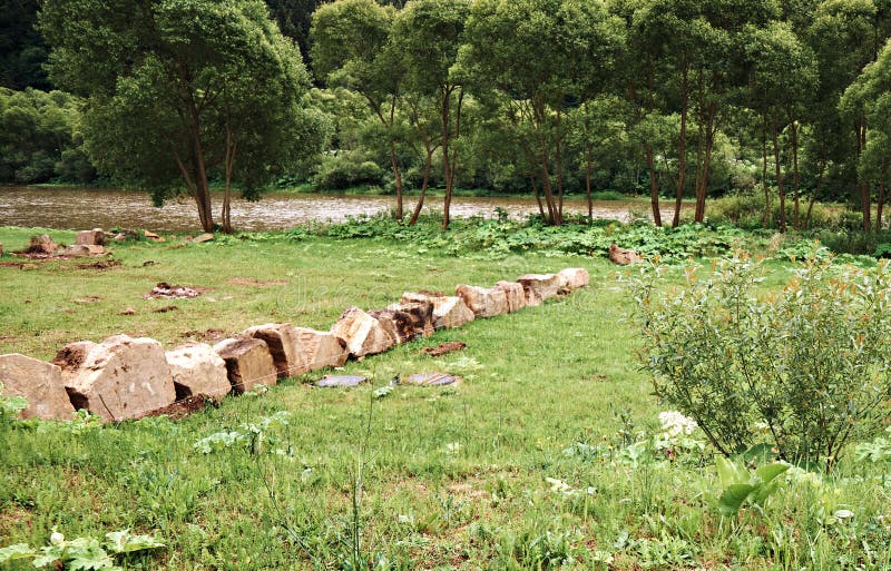 The Beginning of the Construction of a Stone Wall To the River with ...