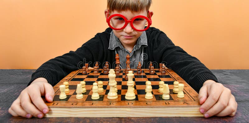 The Beginning of a New Game of Chess with a Young Smart Chess Player in ...