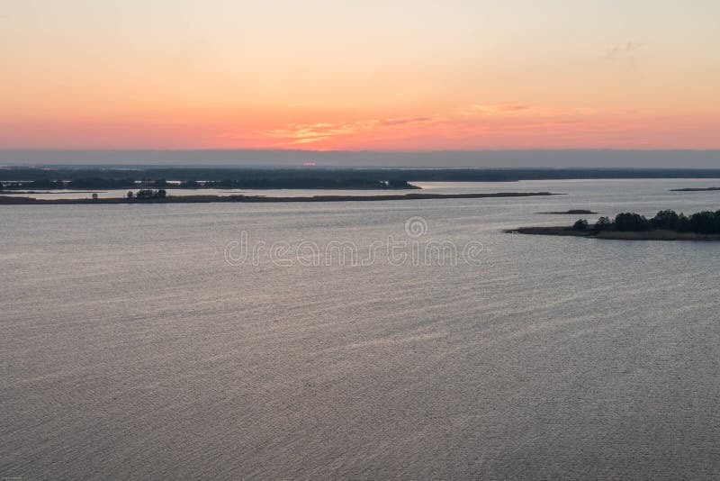 The Beginning of the Sun Rising Above the River. the Sun is in the ...