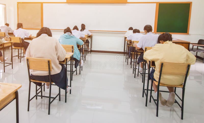 Behind Asian School Students in Uniform Taking Examination and Writing ...